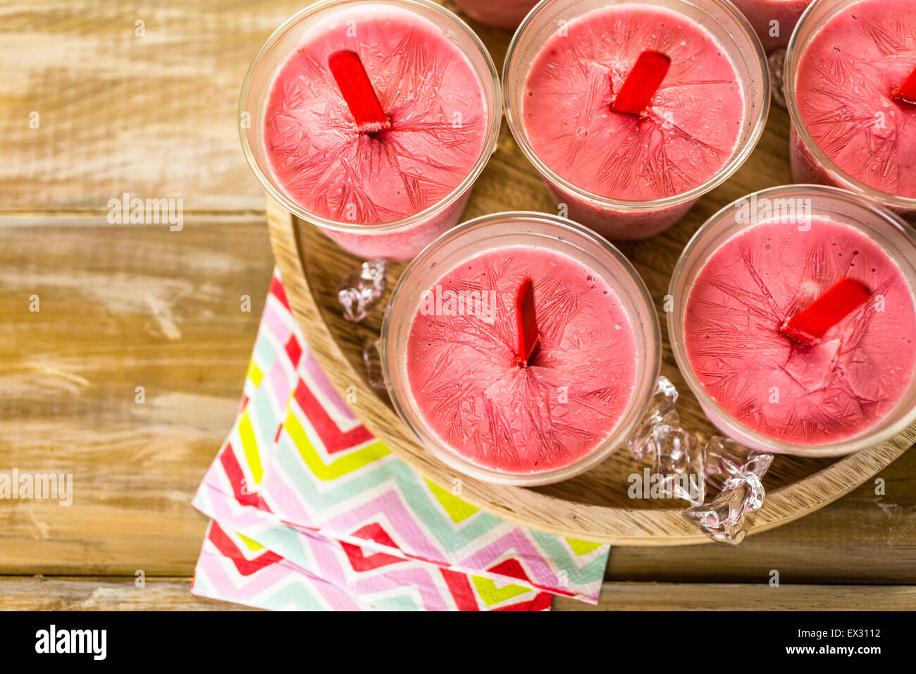 Homemade strawberry popsicles made in plastic cups Stock Photo - Alamy