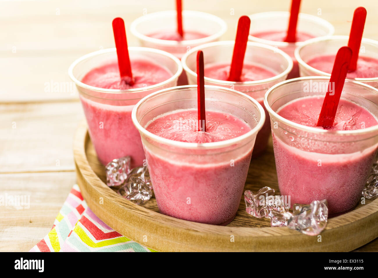 Homemade strawberry popsicles made in plastic cups Stock Photo - Alamy