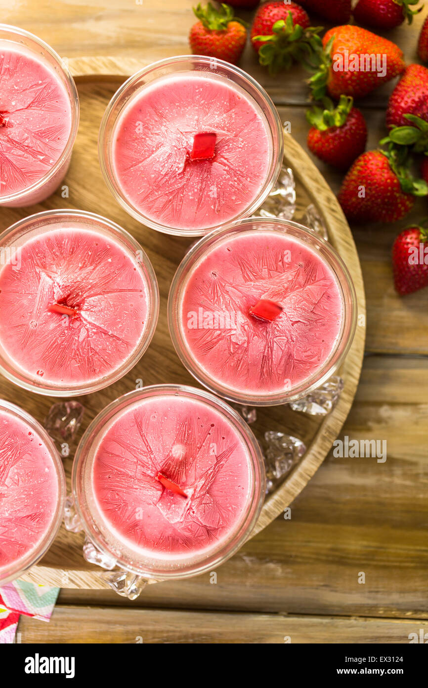 Homemade strawberry popsicles made in plastic cups Stock Photo - Alamy