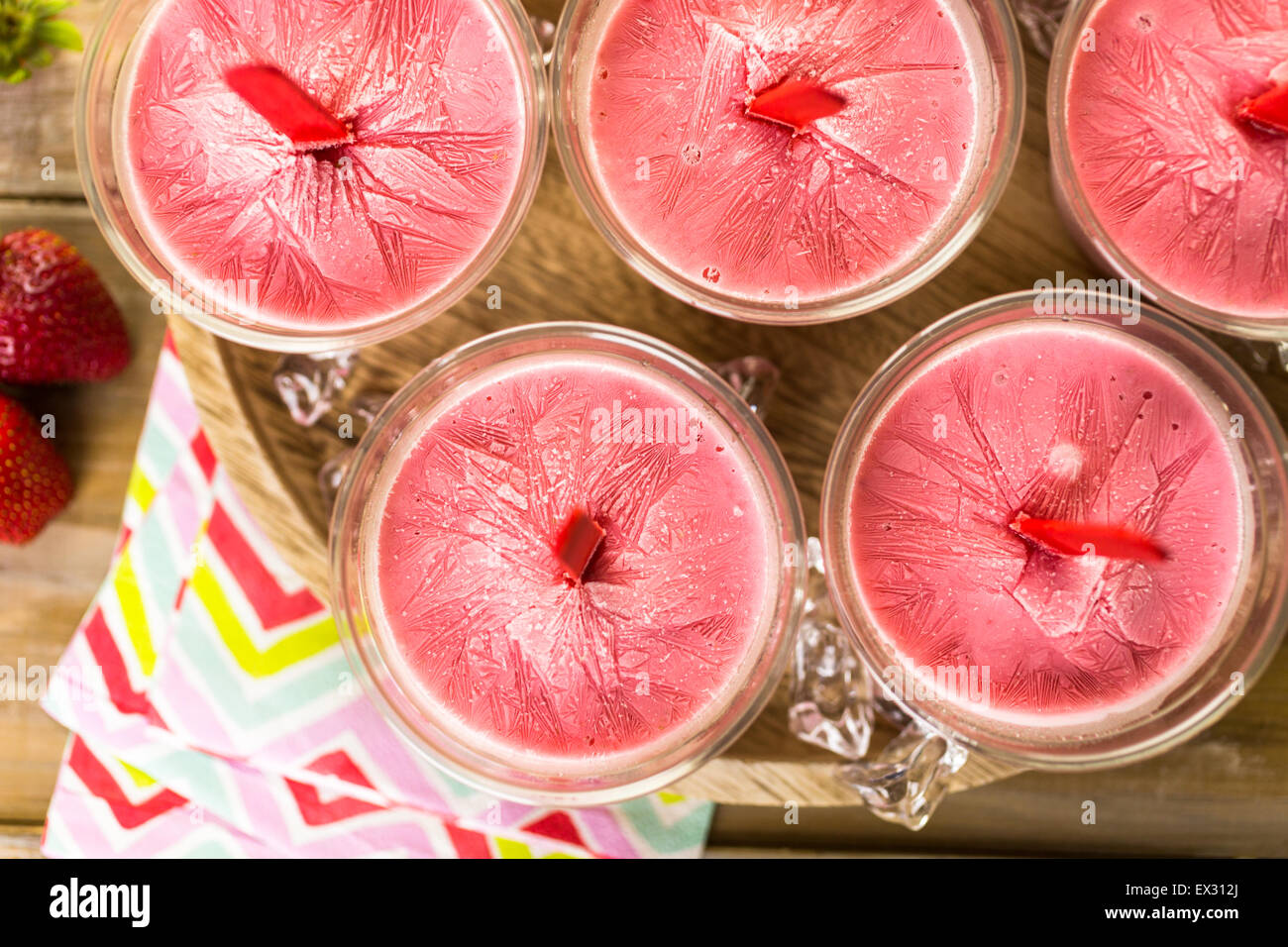 Homemade strawberry popsicles made in plastic cups Stock Photo - Alamy