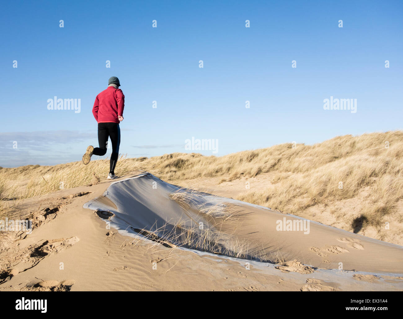 Man covered in sand hi-res stock photography and images - Alamy