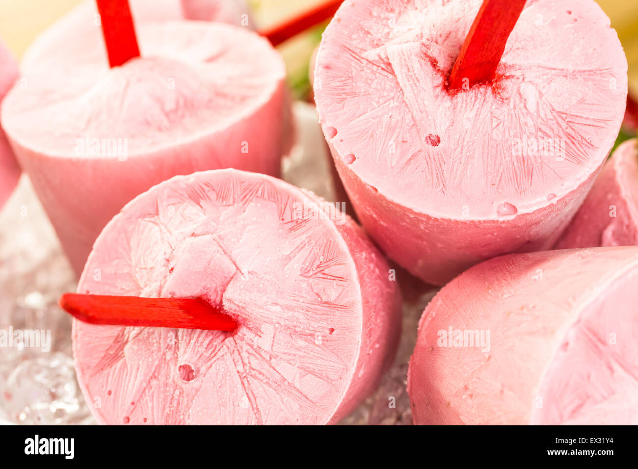 Homemade strawberry popsicles made in plastic cups Stock Photo - Alamy