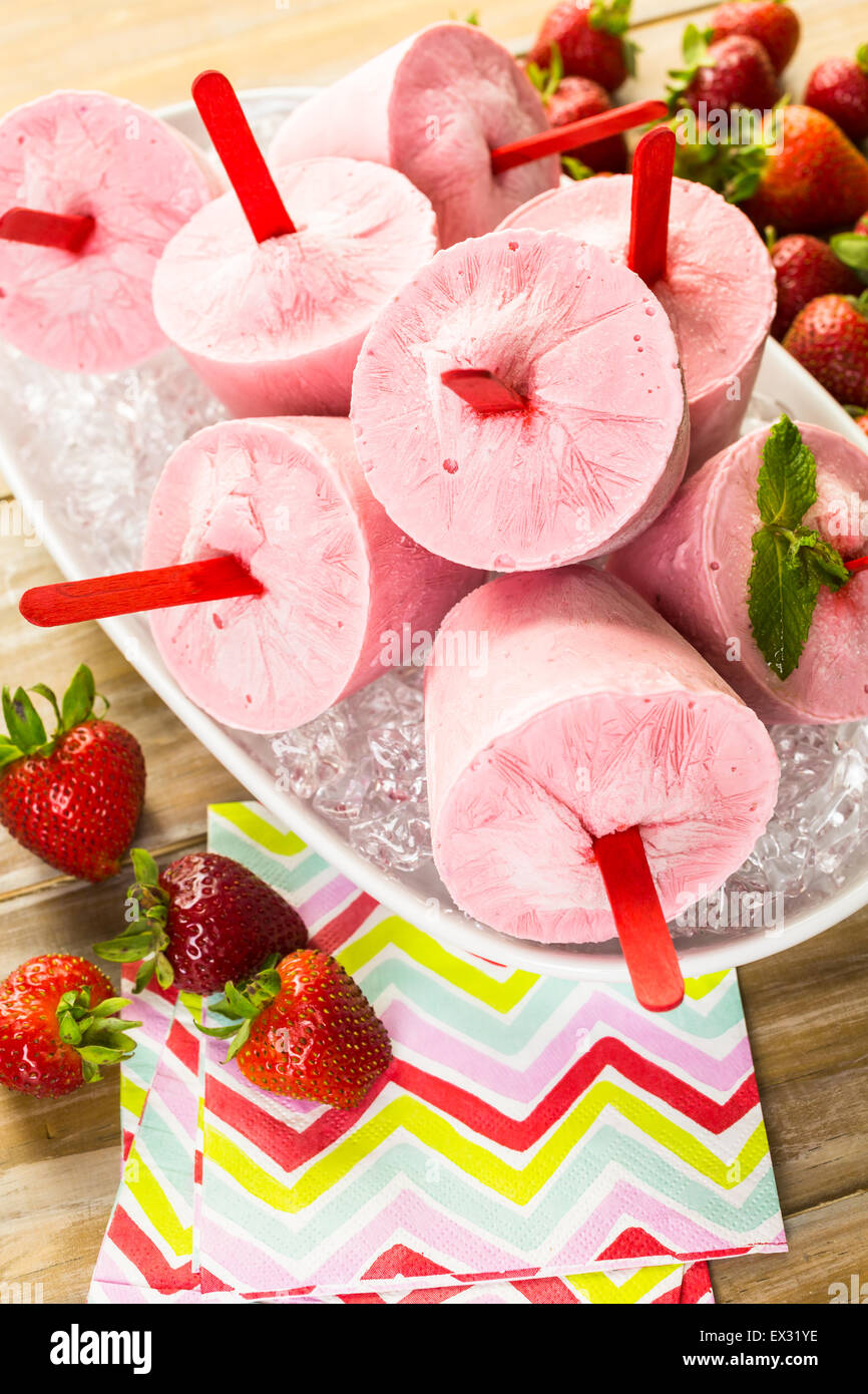 Homemade strawberry popsicles made in plastic cups Stock Photo - Alamy