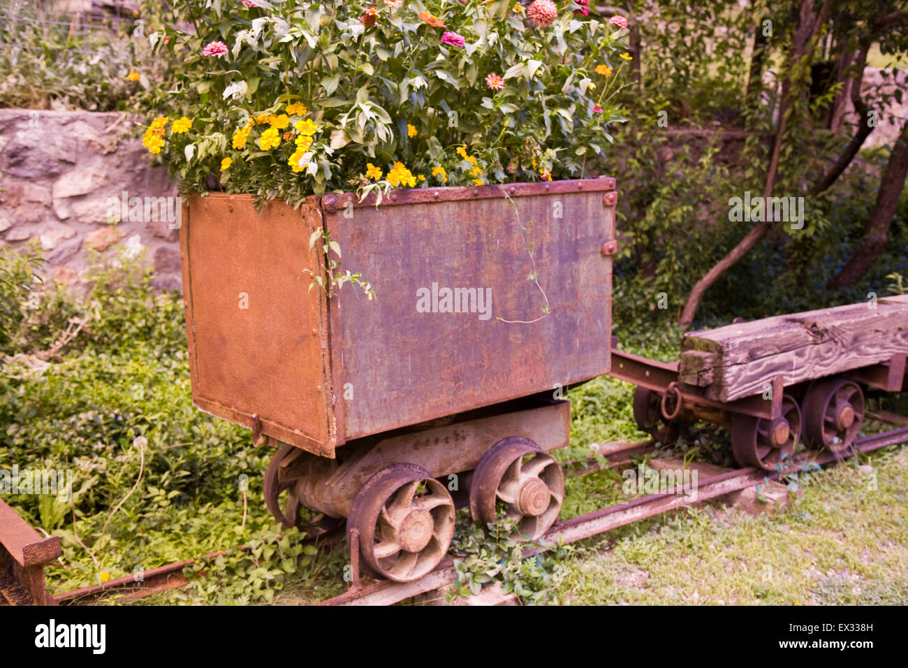Relics of a long-past mining boom litter the main street of Mogollon ...