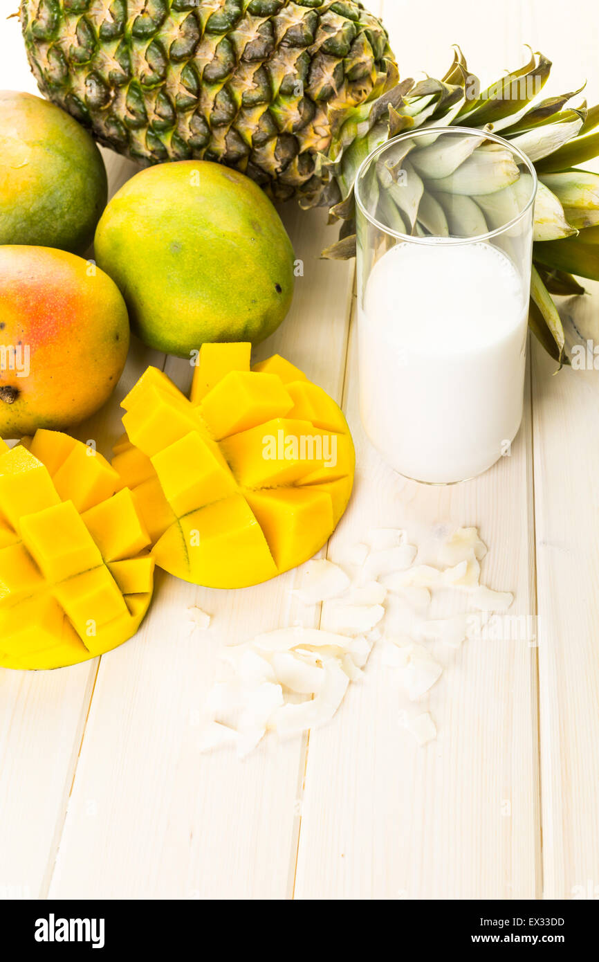 Fresh ingredients on the table to make smoothie with tropical fruits ...