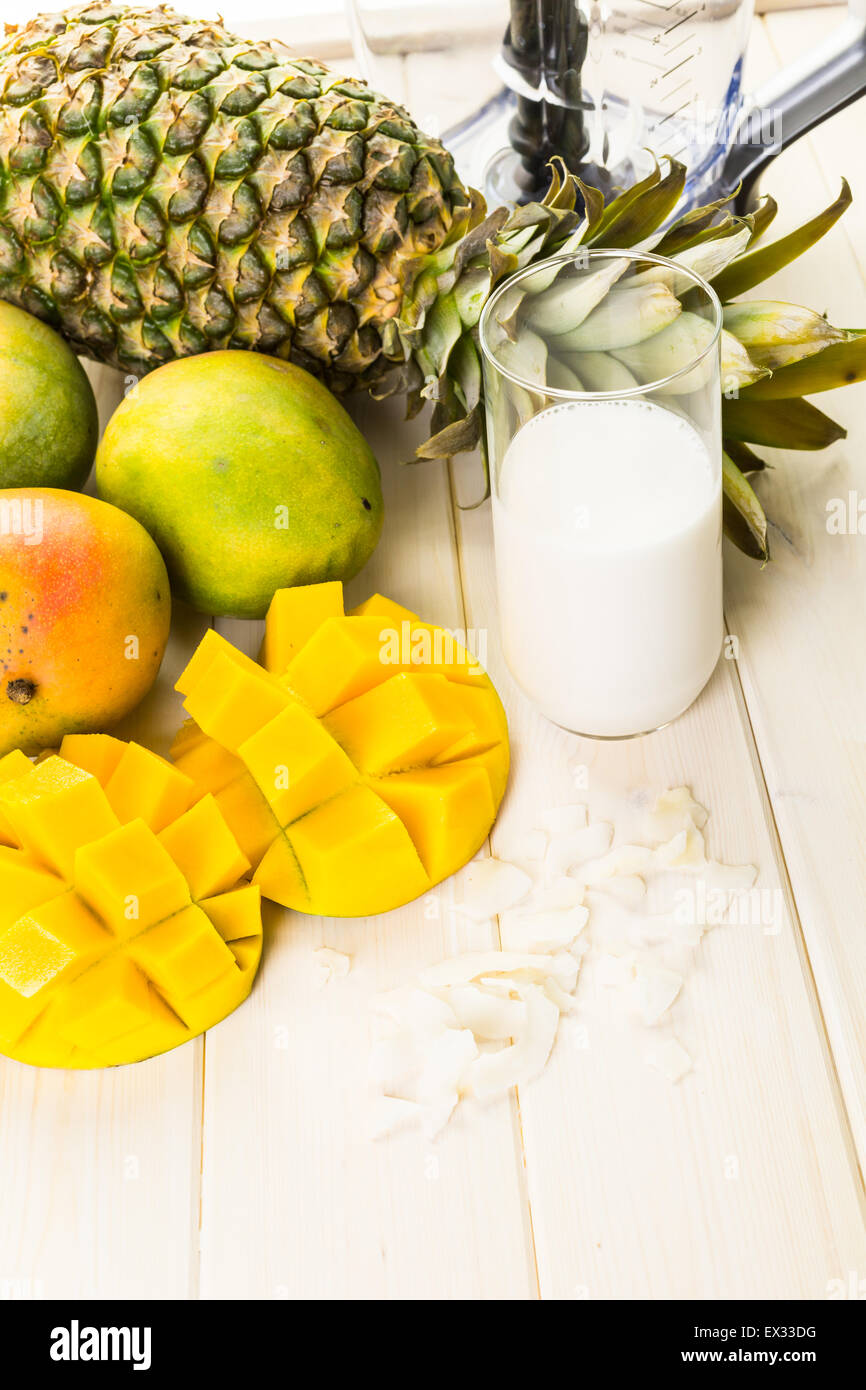 Fresh ingredients on the table to make smoothie with tropical fruits ...