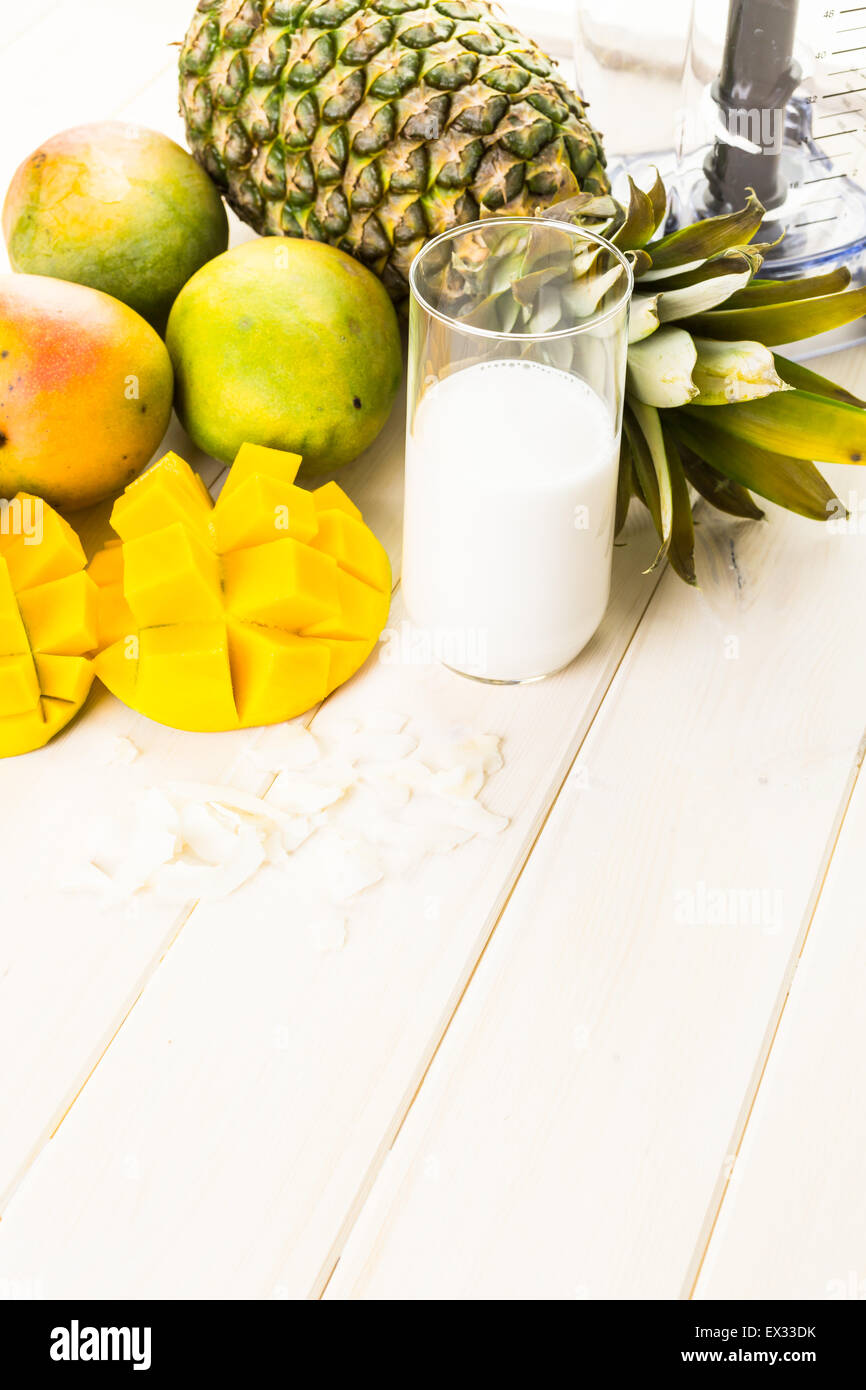 Fresh ingredients on the table to make smoothie with tropical fruits ...