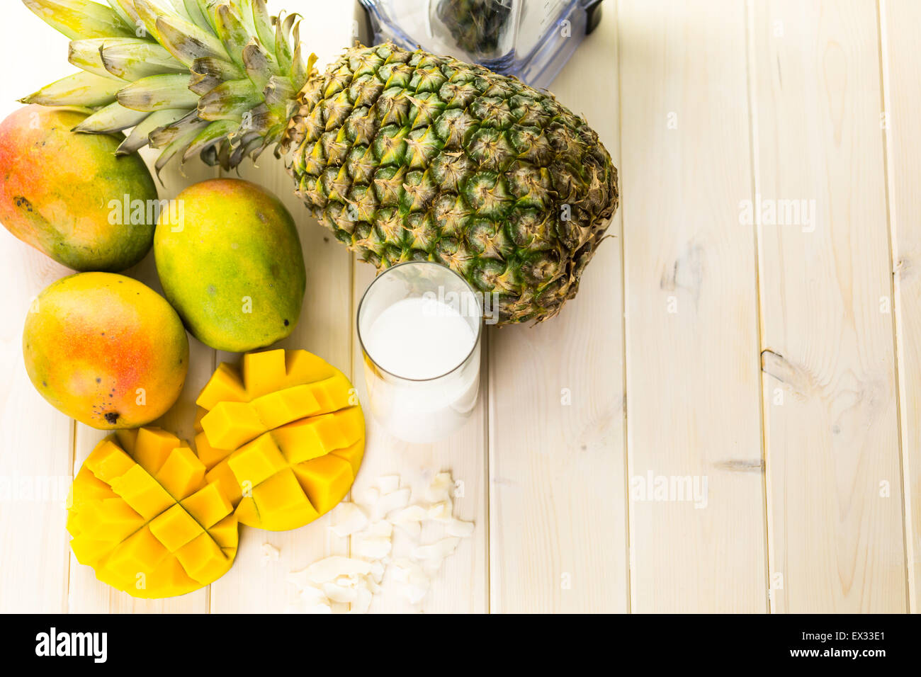 Fresh ingredients on the table to make smoothie with tropical fruits ...
