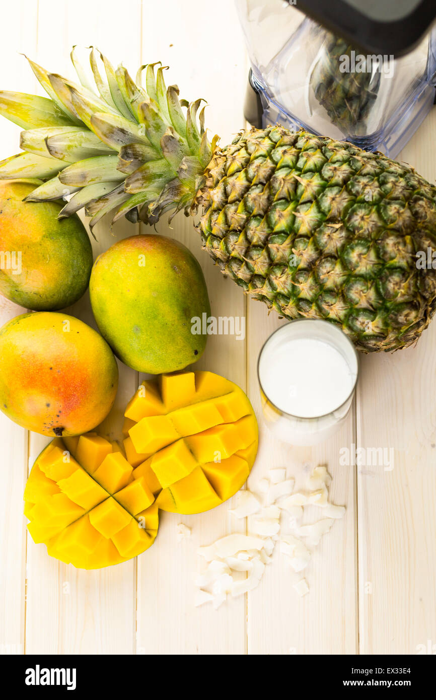 Fresh ingredients on the table to make smoothie with tropical fruits ...