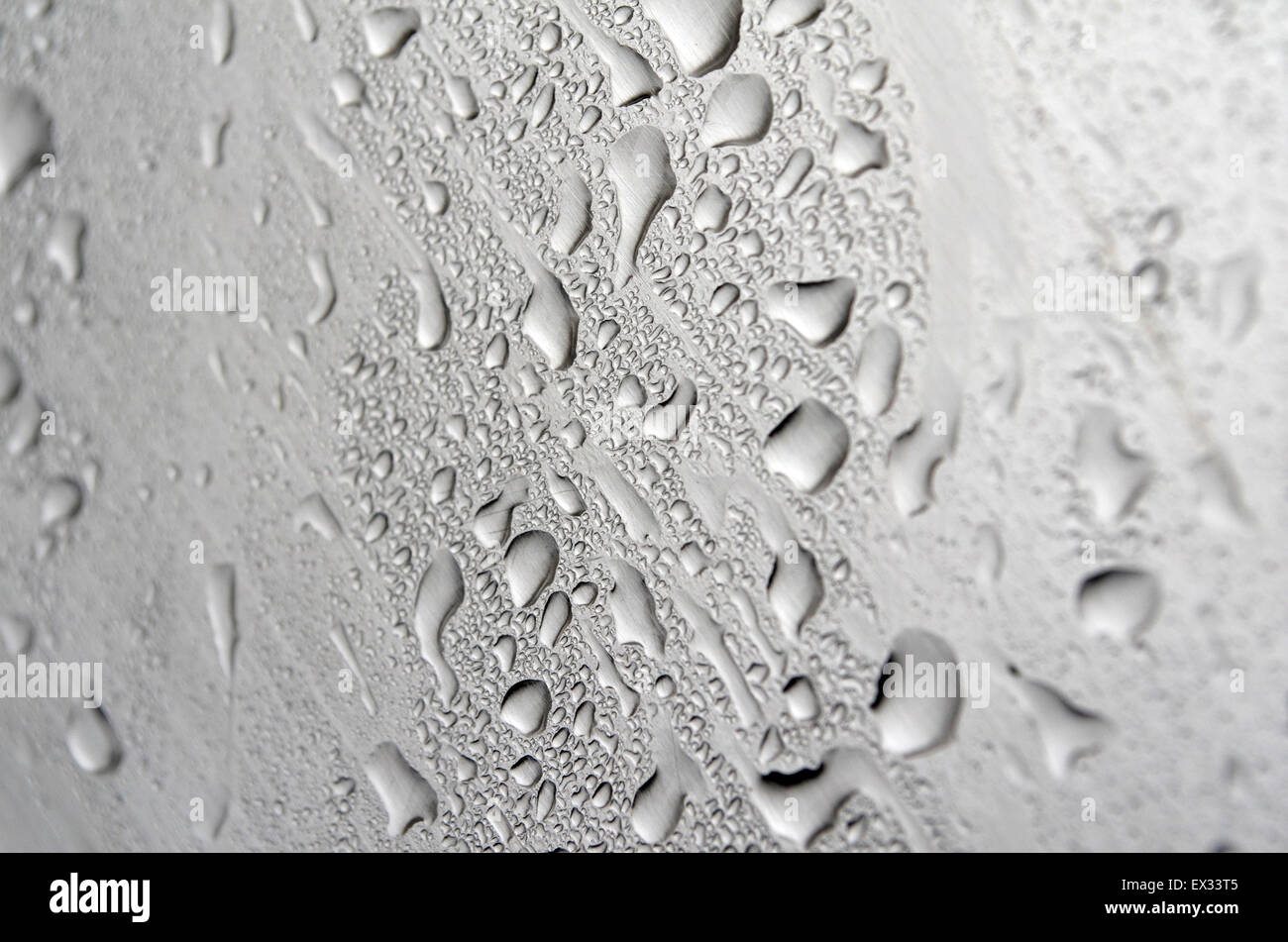 Detail of rain water on the stainless steel chute in Dalmuir park ...