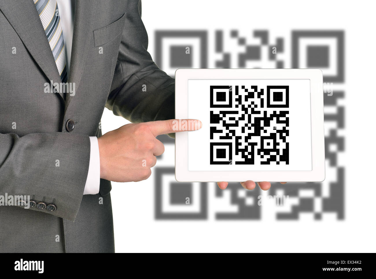 Businessman holding QR-code Stock Photo - Alamy