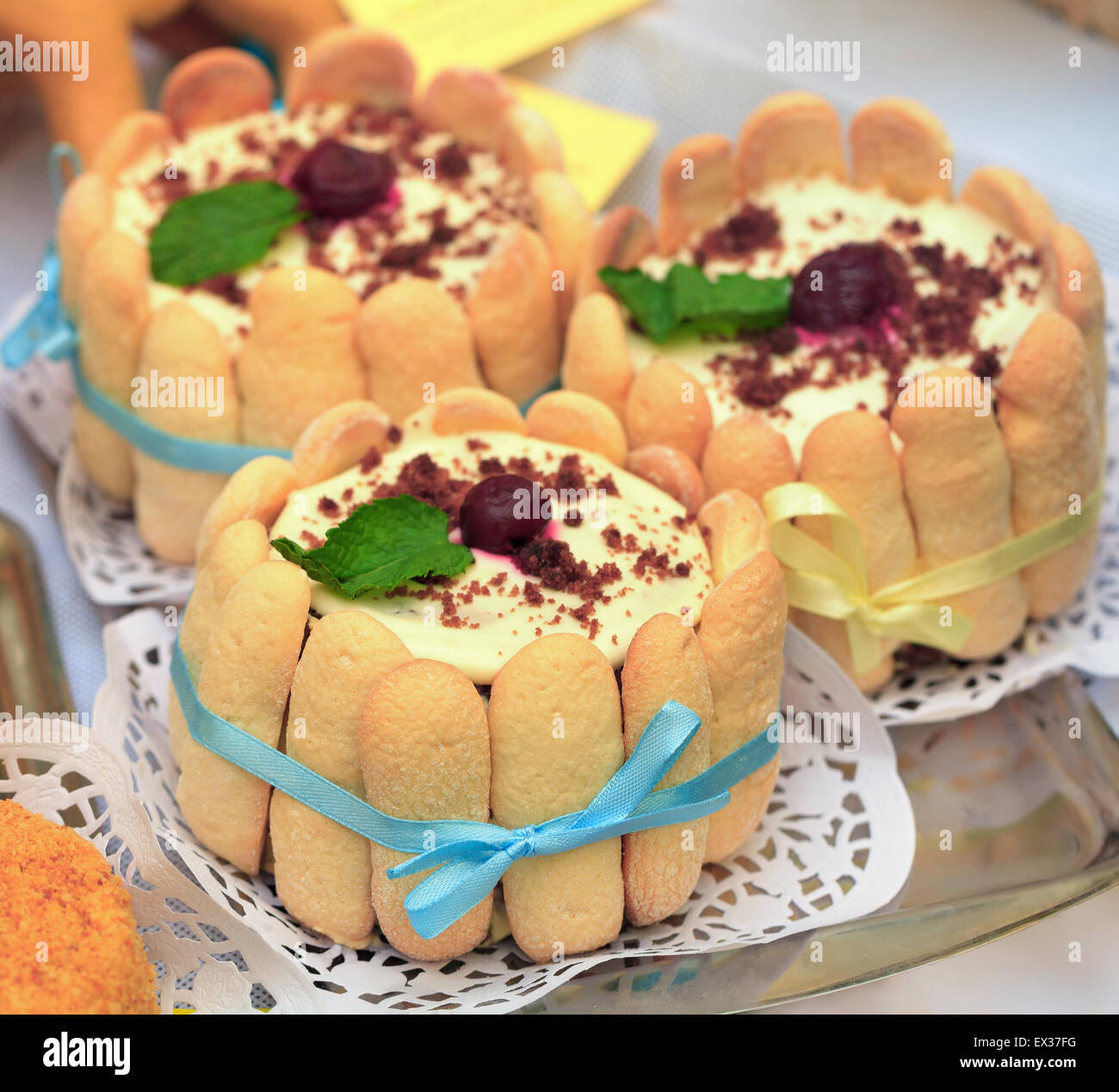 savoiardi cake topped with cherry Stock Photo - Alamy