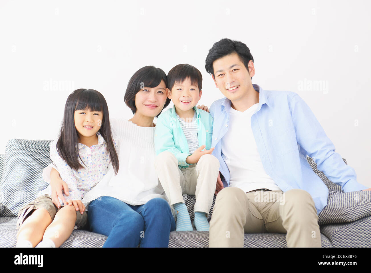 Japanese family on the sofa Stock Photo - Alamy