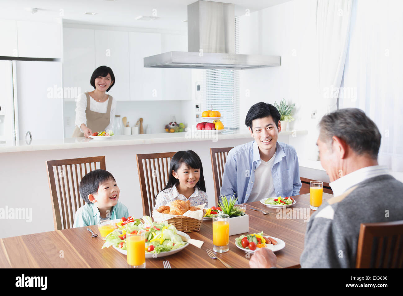 Three-generation Japanese family together in the kitchen Stock Photo ...