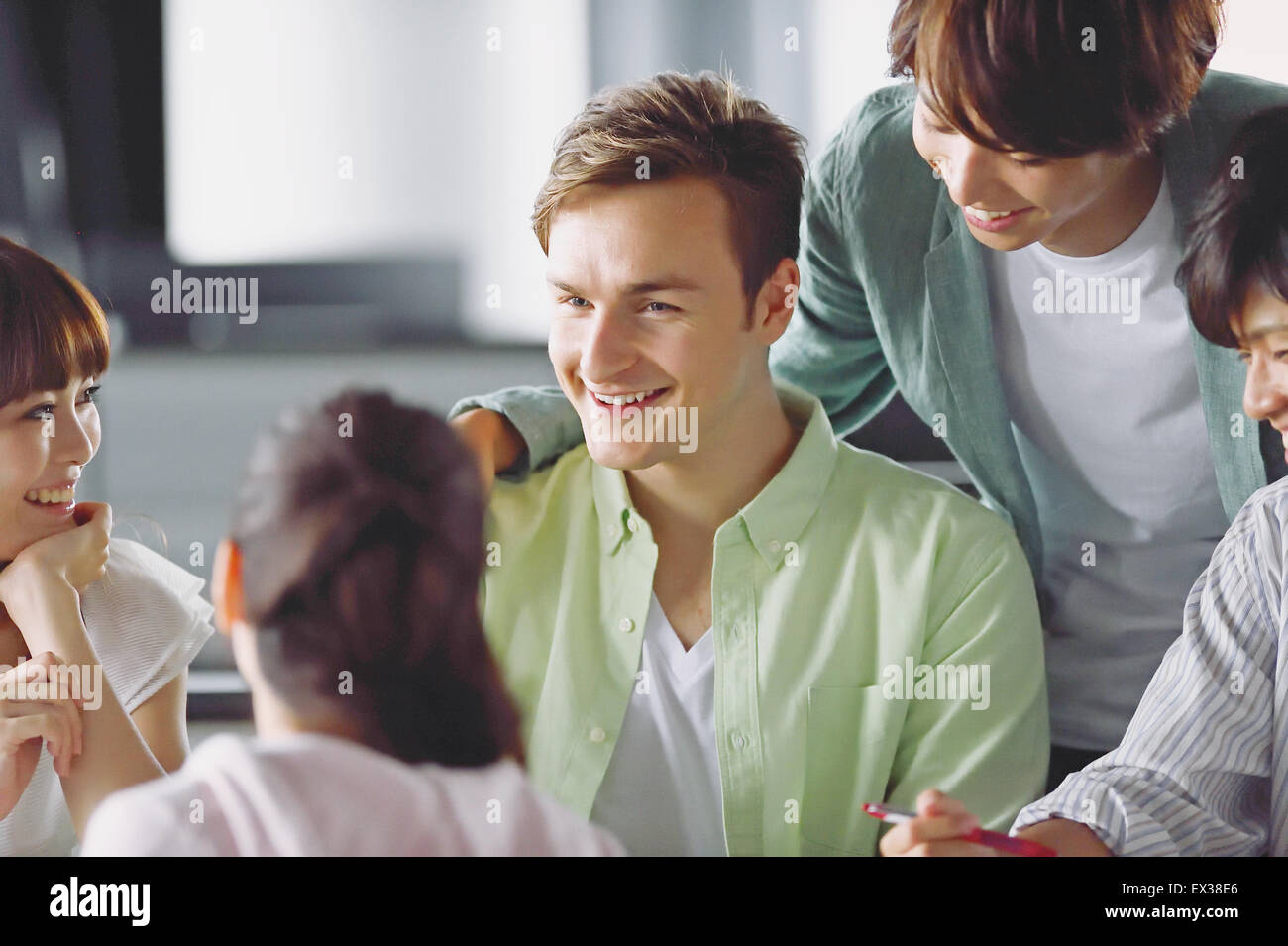 Young students in discussion hi-res stock photography and images - Alamy