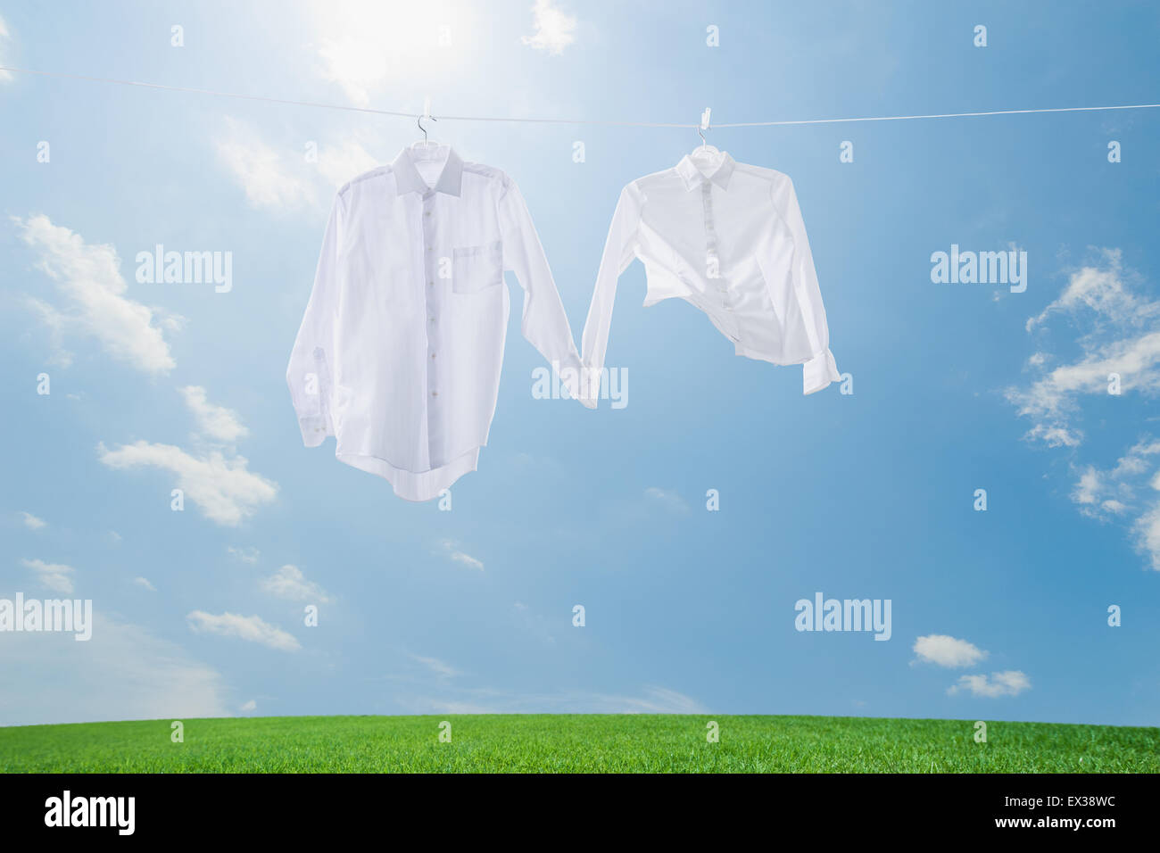 Laundry drying up on washing line Stock Photo - Alamy