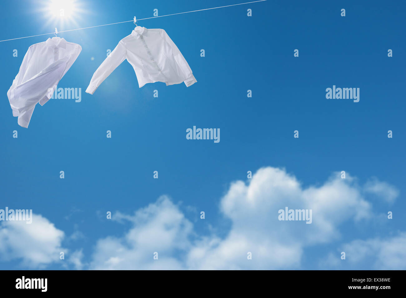 Laundry drying up on washing line Stock Photo - Alamy