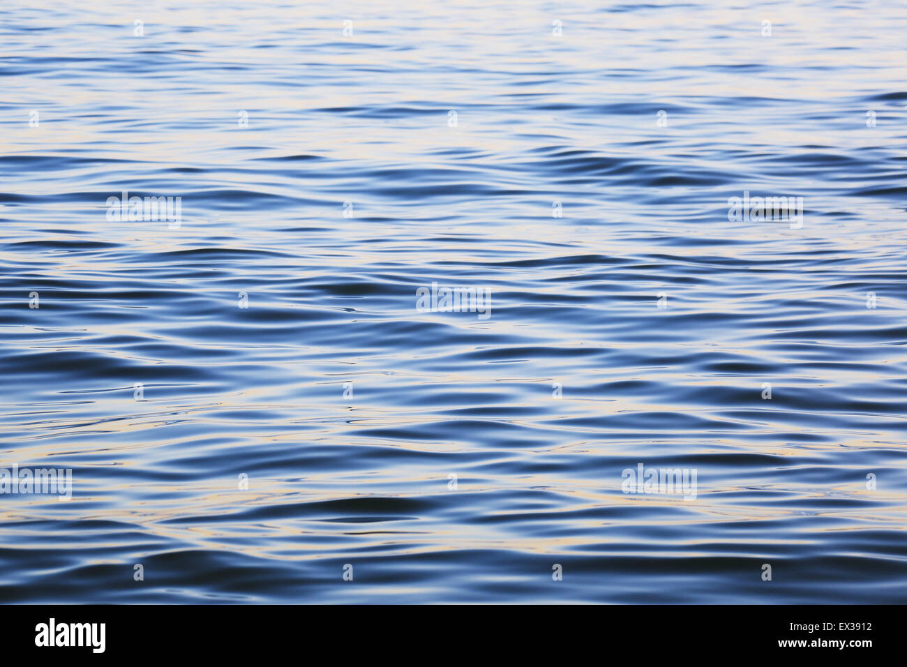 Reflections on sea surface Stock Photo - Alamy