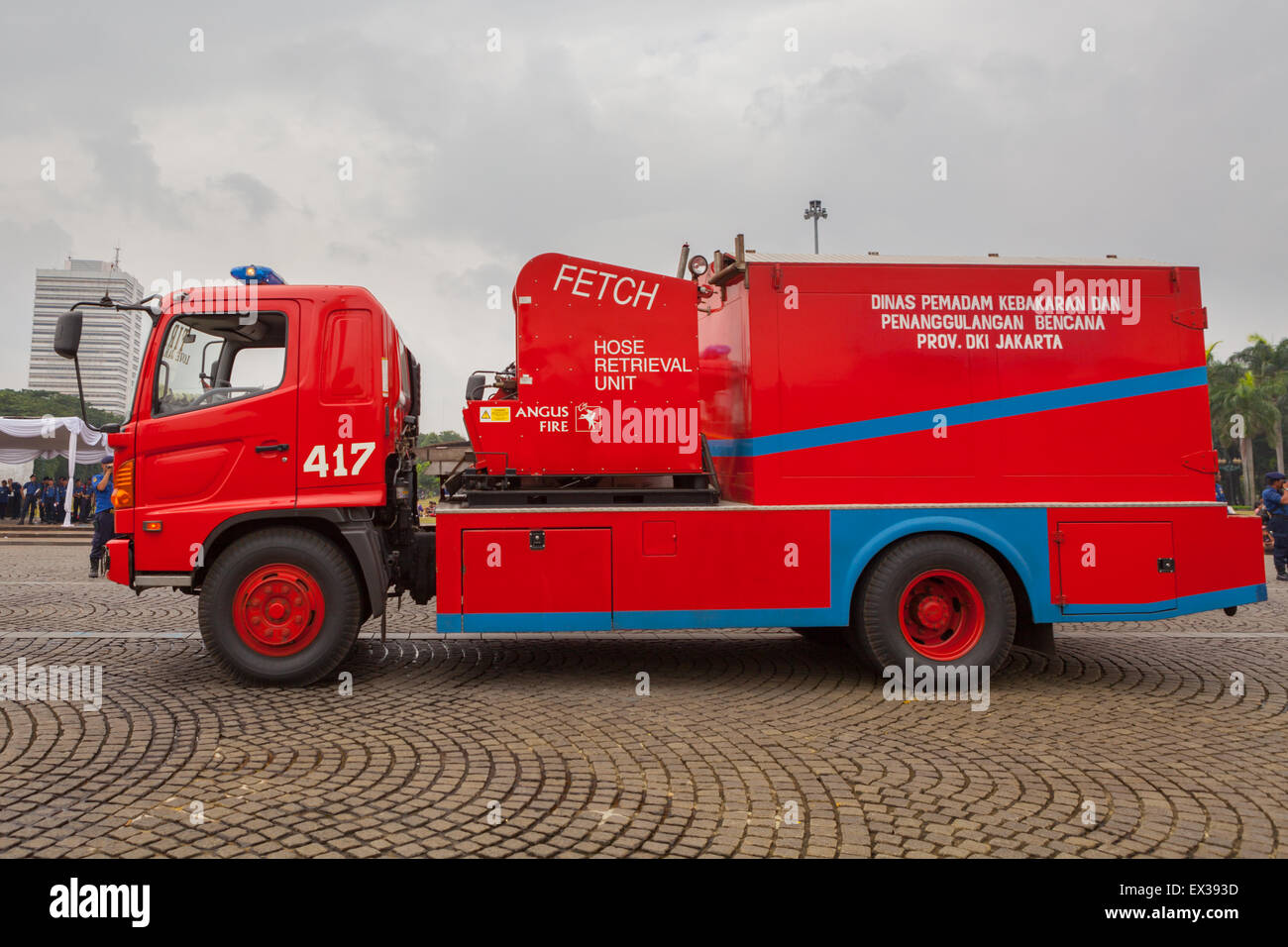 A hose retrieval unit firetruck is photographed as it is displayed ...
