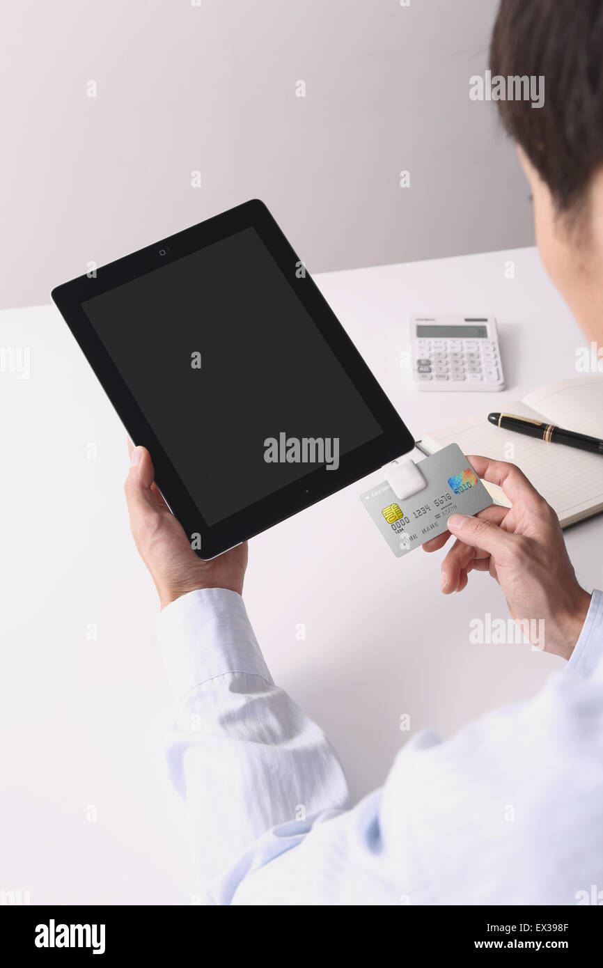 Cashless payment devices Stock Photo - Alamy