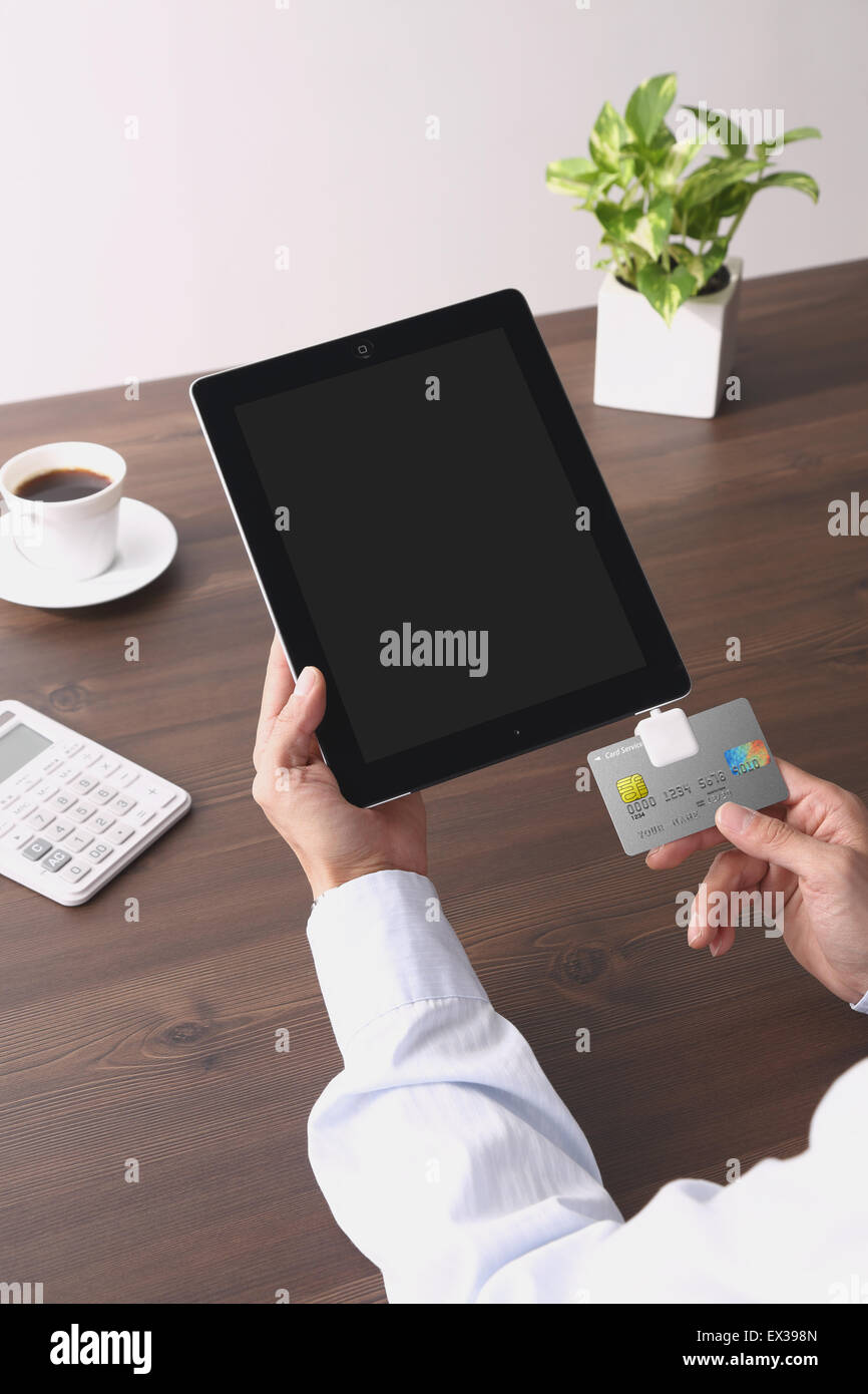 Cashless payment devices Stock Photo - Alamy