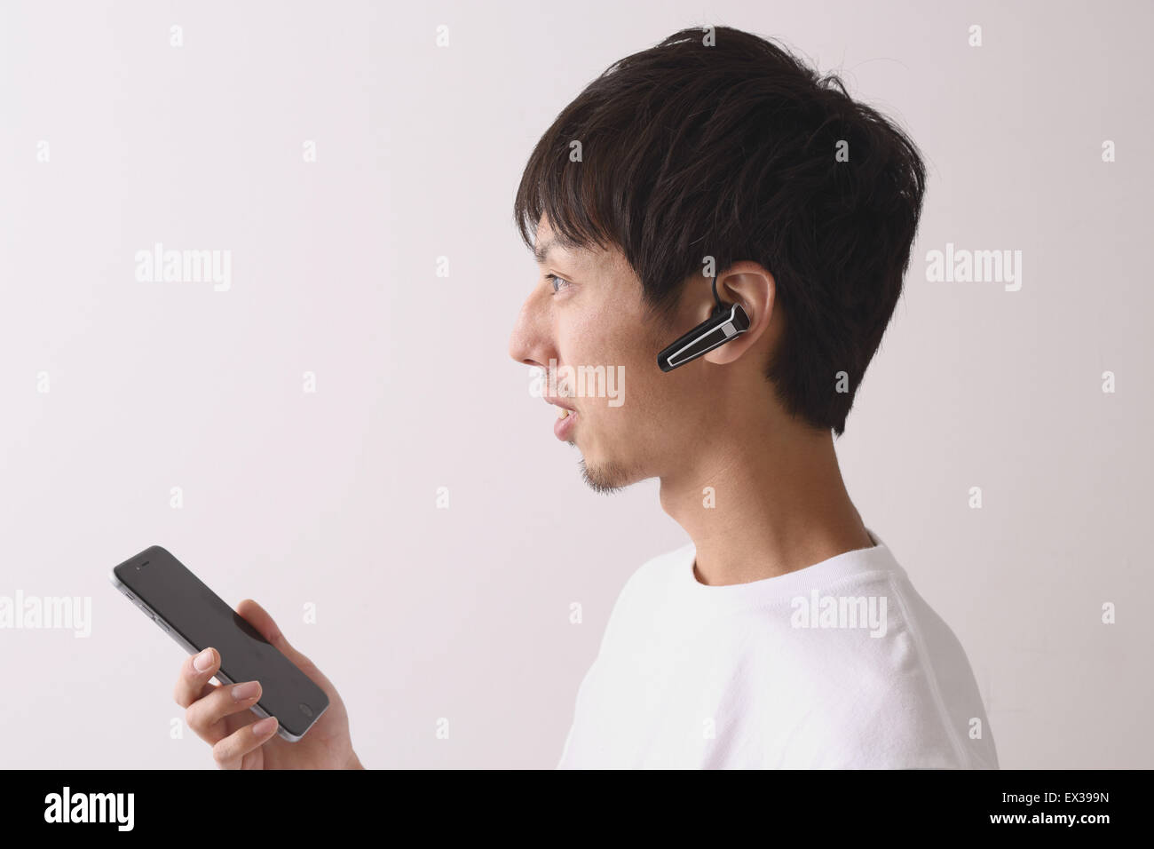 Asian man with telephone headset hi-res stock photography and images ...