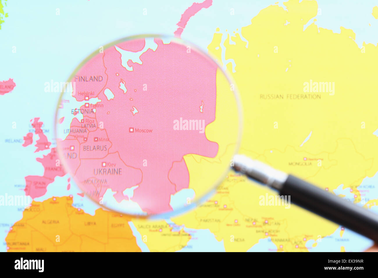 World map and magnifying glass Stock Photo - Alamy