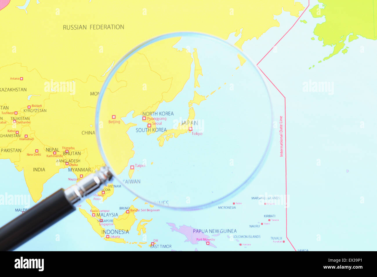 World map and magnifying glass Stock Photo - Alamy