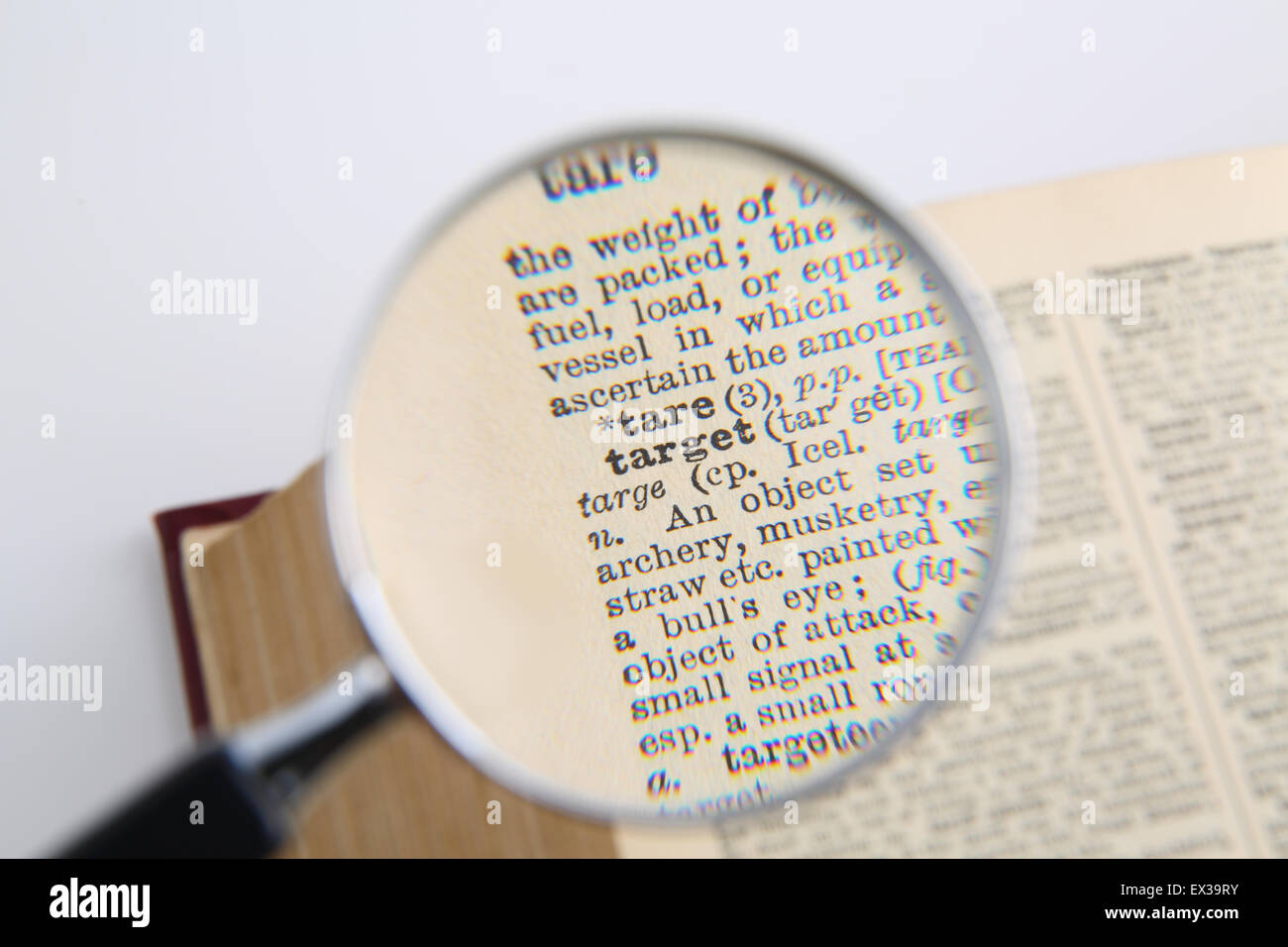 Dictionary and magnifying glass Stock Photo - Alamy Dictionary and magnifying glass Stock Photo - Alamy