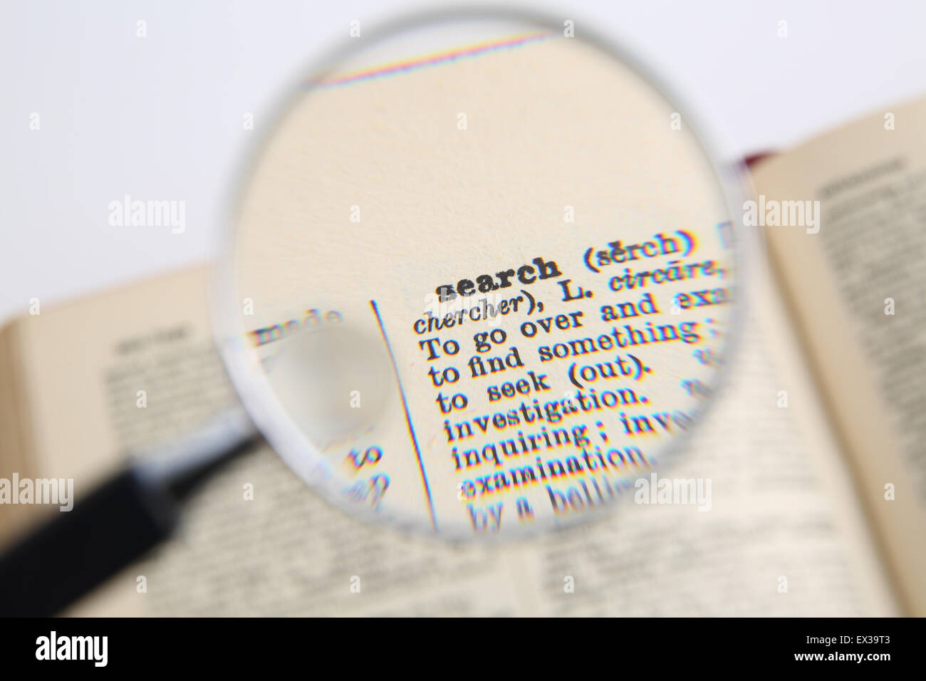 Dictionary and magnifying glass Stock Photo - Alamy Dictionary and magnifying glass Stock Photo - Alamy