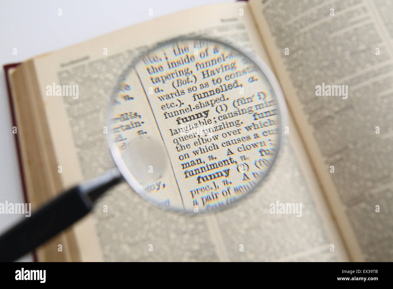 Dictionary and magnifying glass Stock Photo - Alamy Dictionary and magnifying glass Stock Photo - Alamy