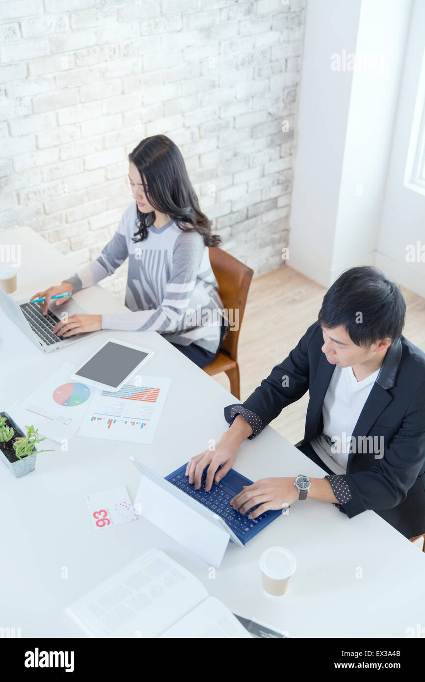 Japanese people working in modern office Stock Photo - Alamy
