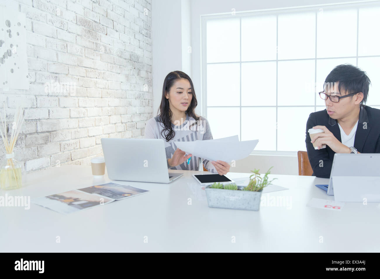Japanese people working in modern office Stock Photo - Alamy