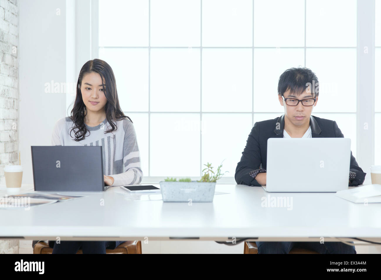 Japanese people working in modern office Stock Photo - Alamy