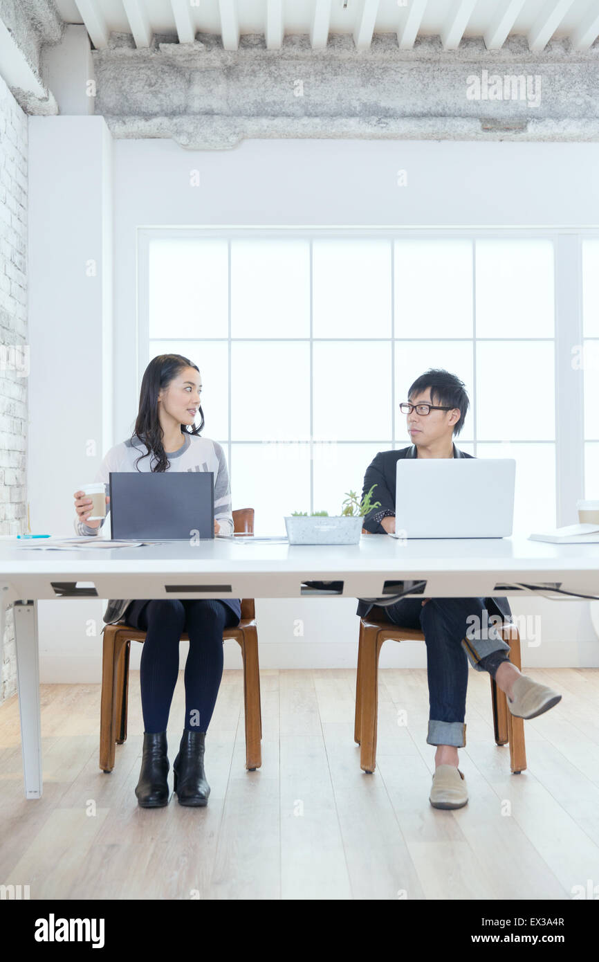 Japanese people working in modern office Stock Photo - Alamy