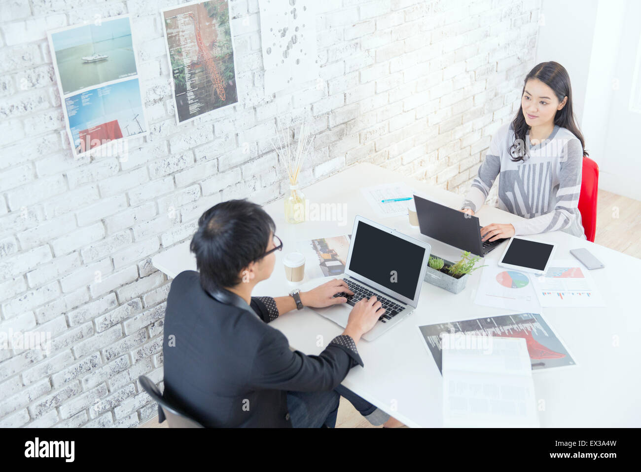 Japanese people working in modern office Stock Photo - Alamy