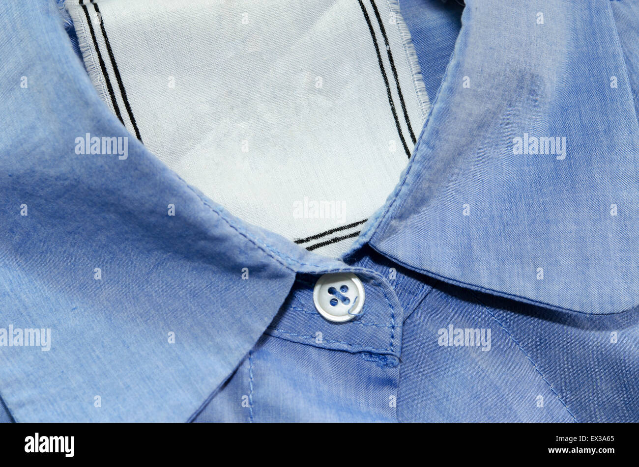 details of striped shirt with blank label Stock Photo - Alamy