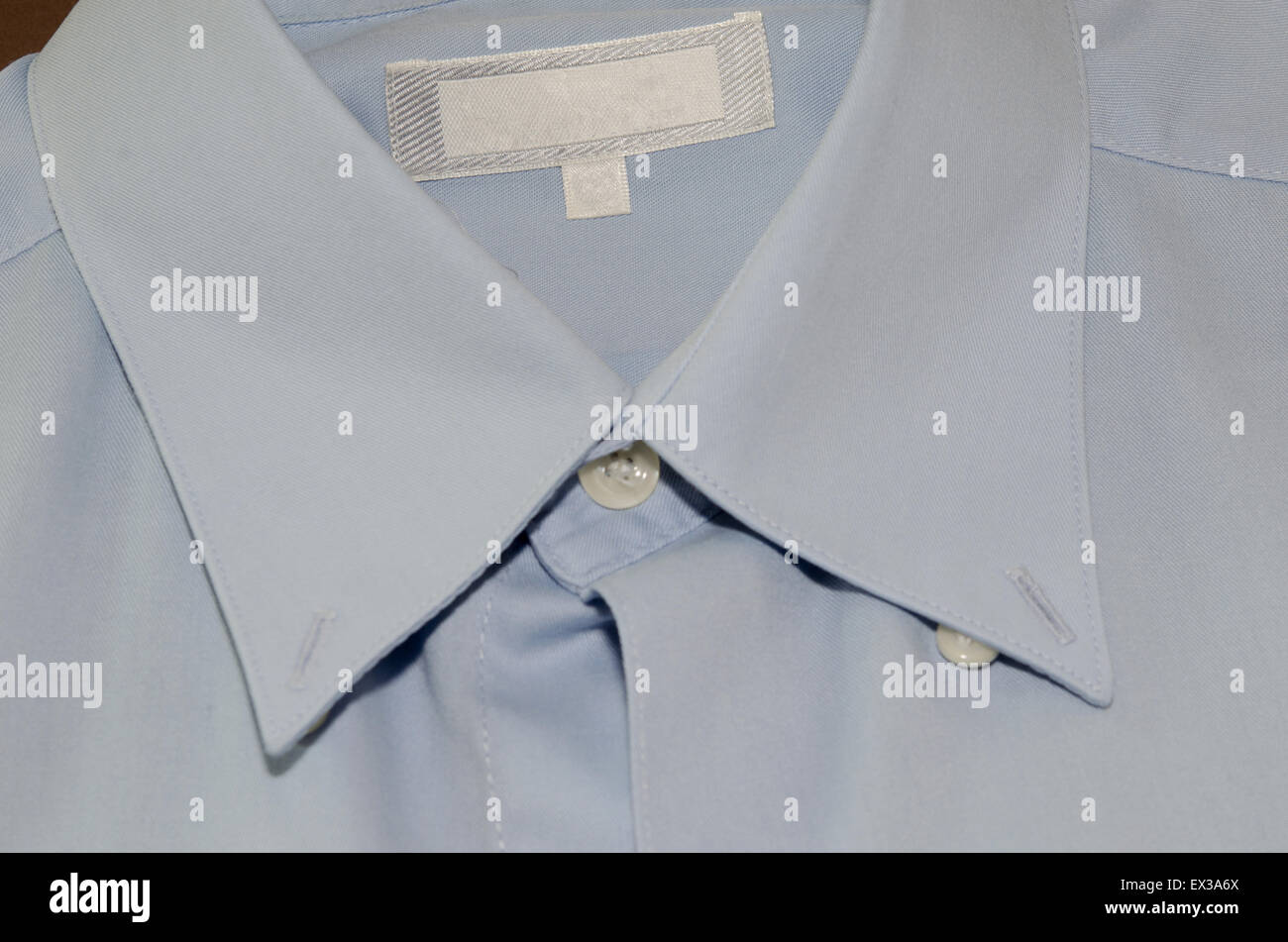 details of striped shirt with blank label Stock Photo - Alamy