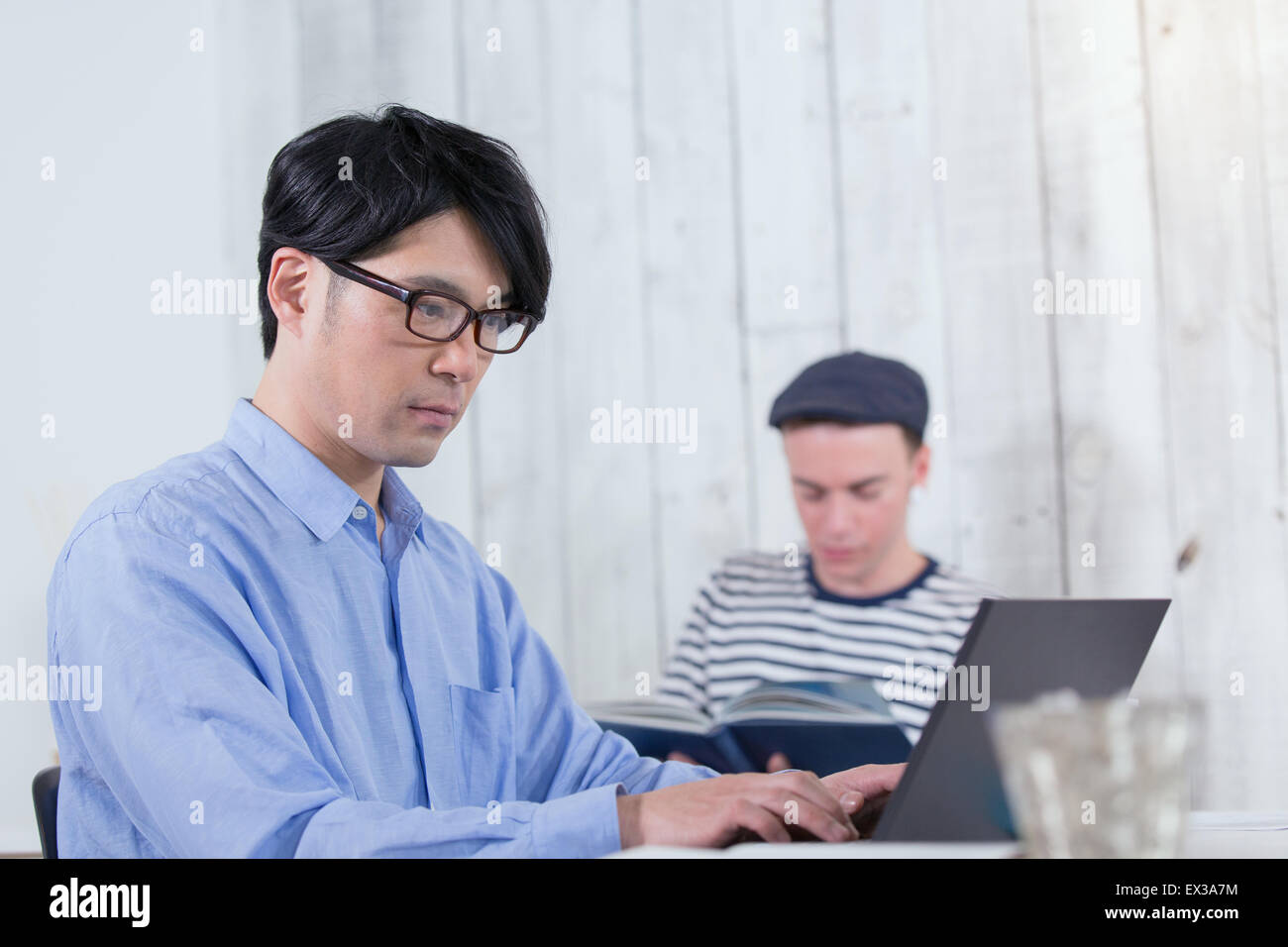 Working ethnic hi-res stock photography and images - Alamy