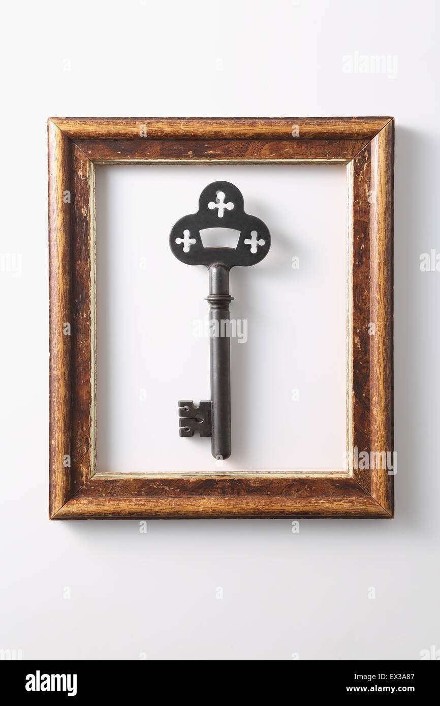 Vintage key and frame Stock Photo - Alamy
