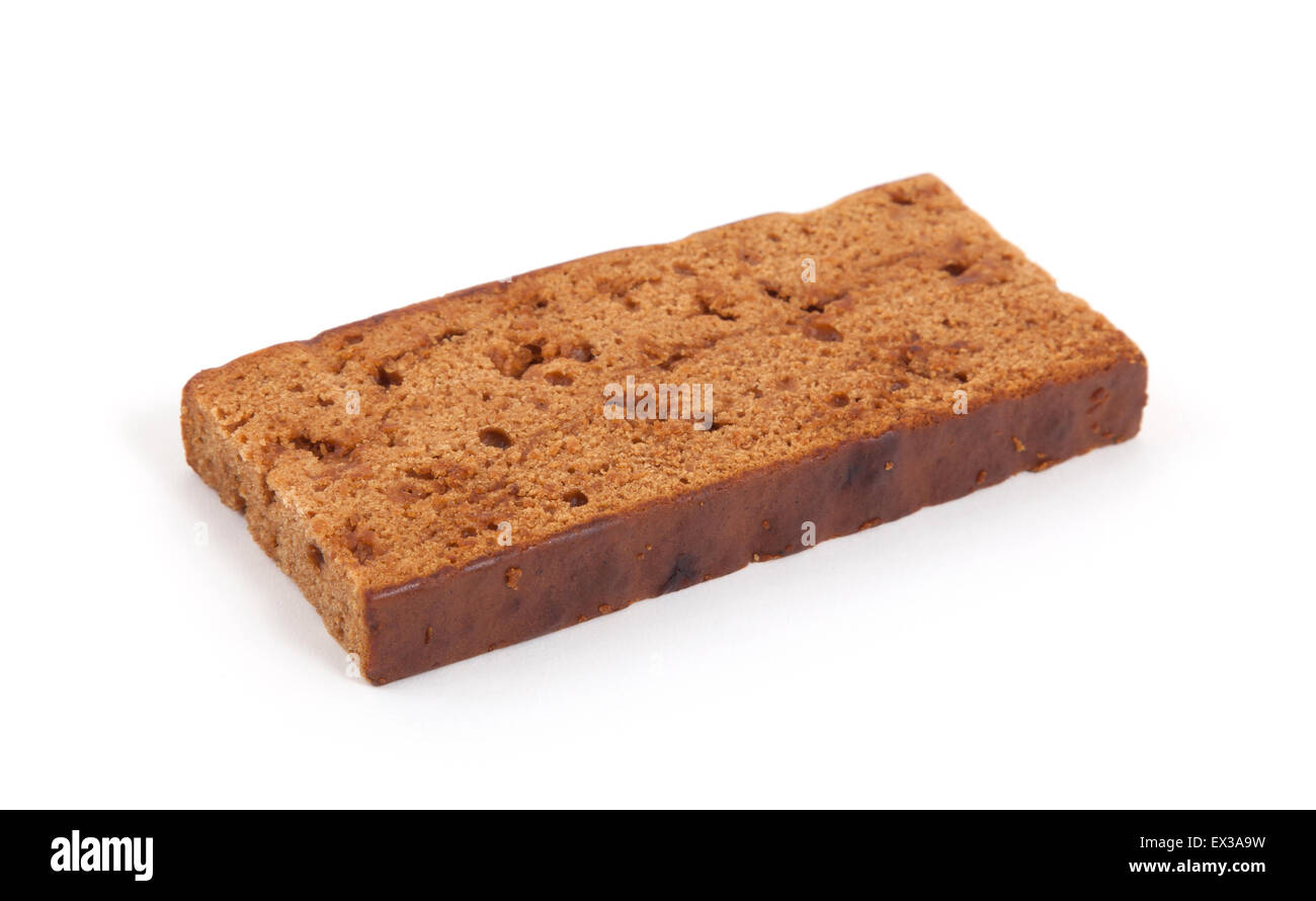 Traditional Dutch dessert cake (ontbijtkoek) on a white background ...