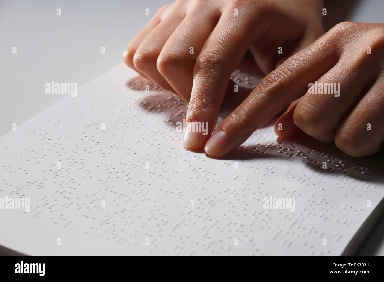 Hands reading braille hi-res stock photography and images - Alamy