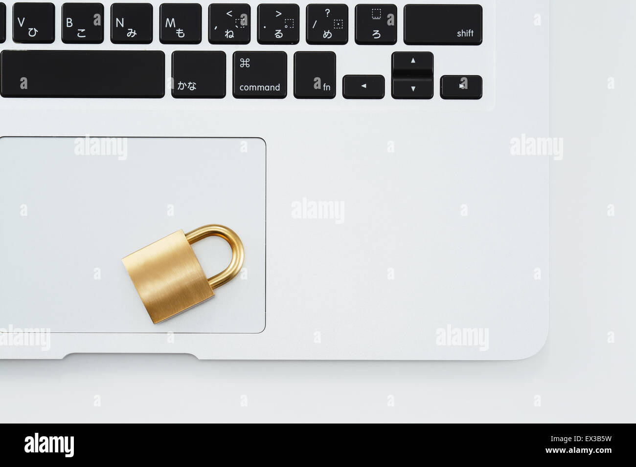 Safety lock and laptop Stock Photo - Alamy