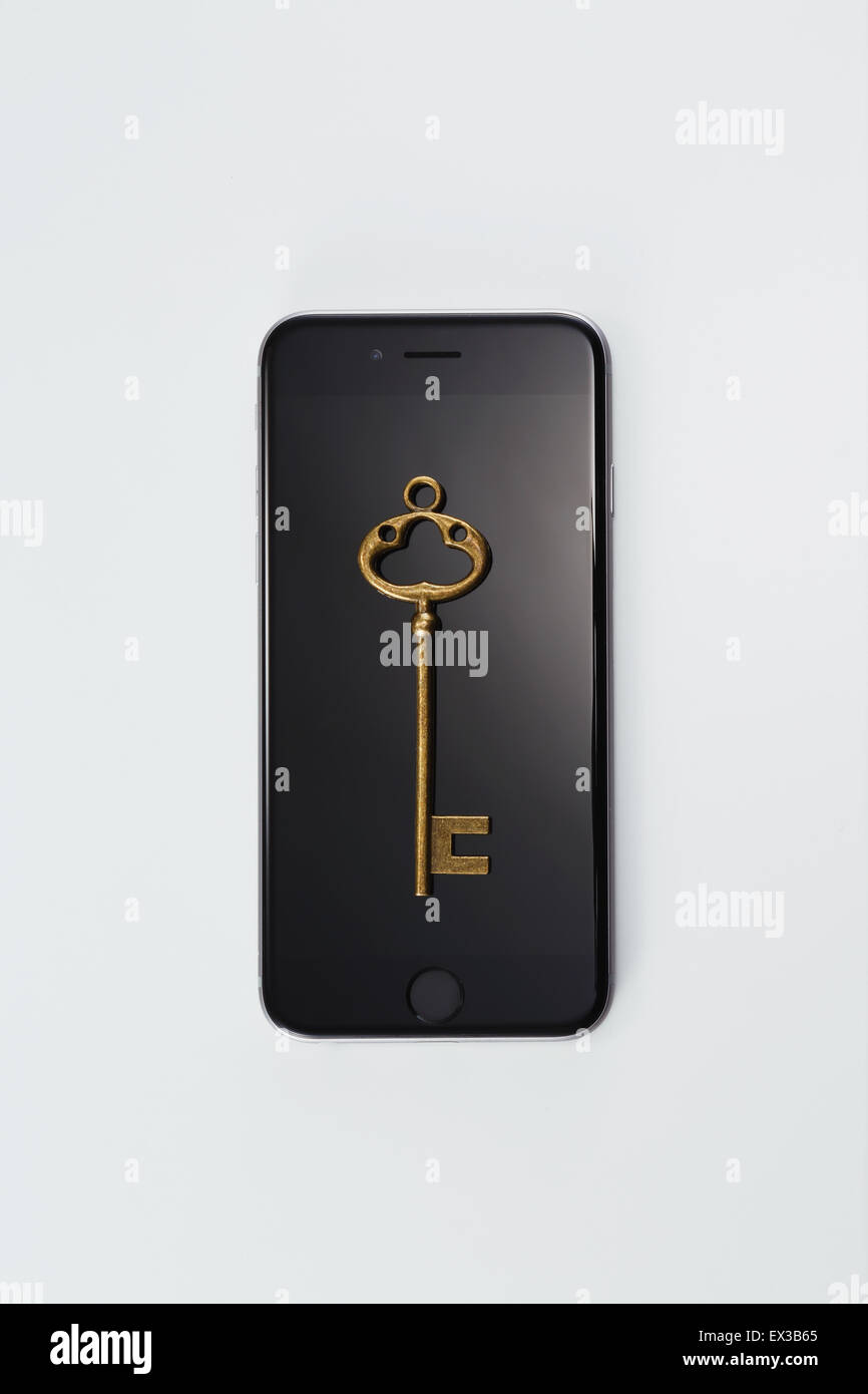 Key and smartphone Stock Photo - Alamy