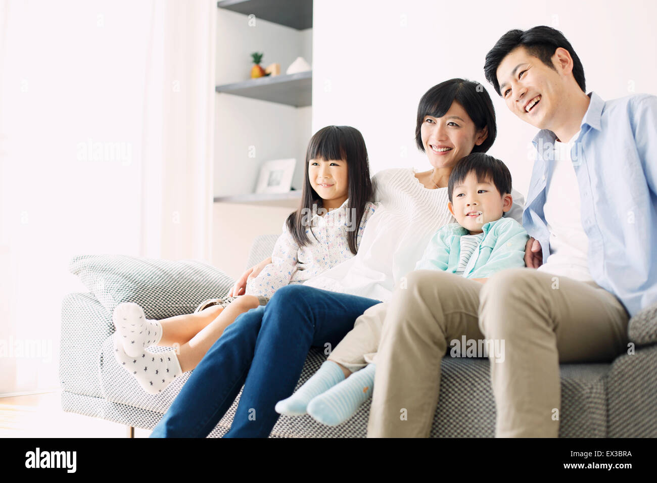 Japanese family on the sofa Stock Photo - Alamy