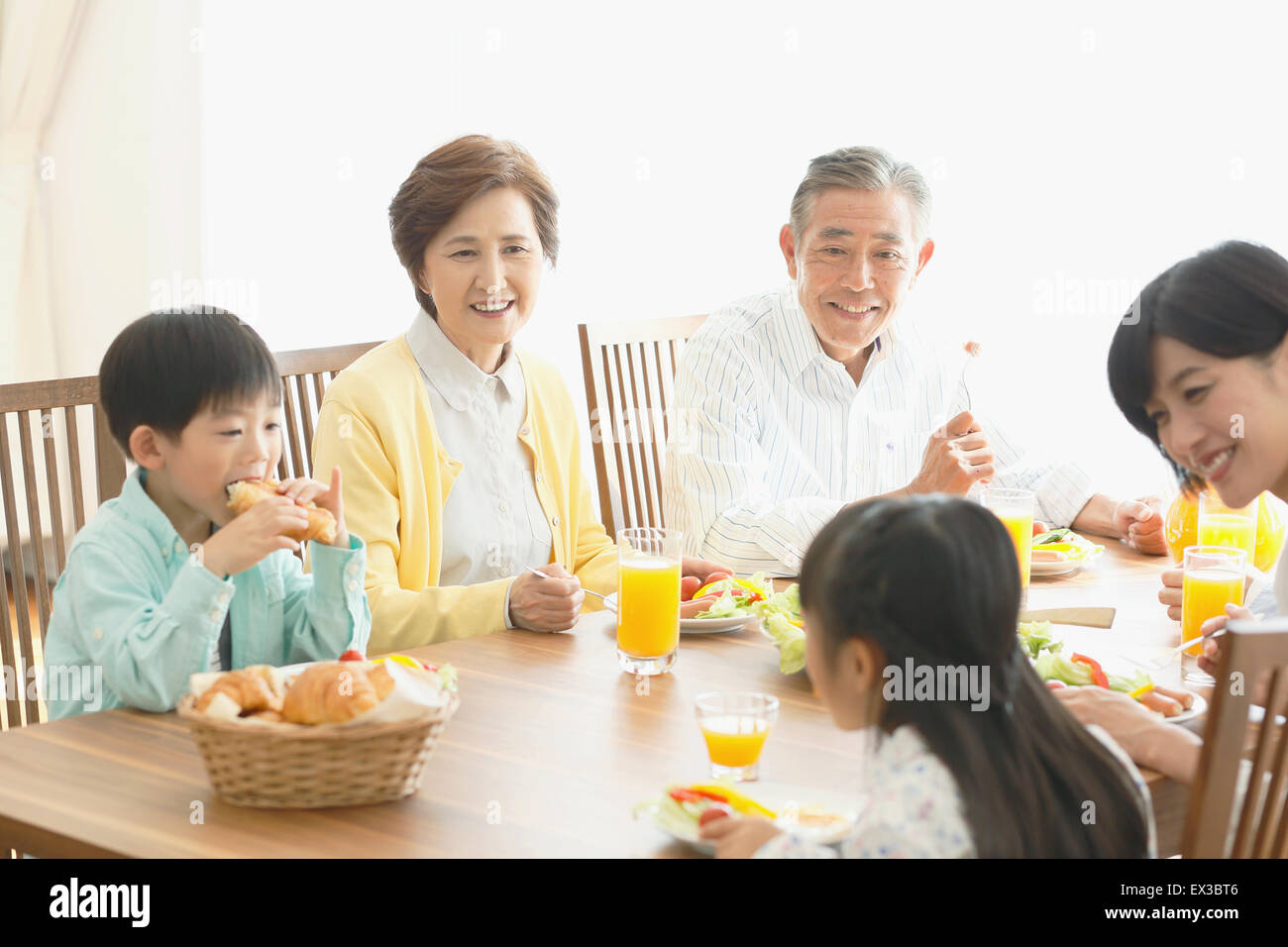 Three-generation Japanese family together in the kitchen Stock Photo ...