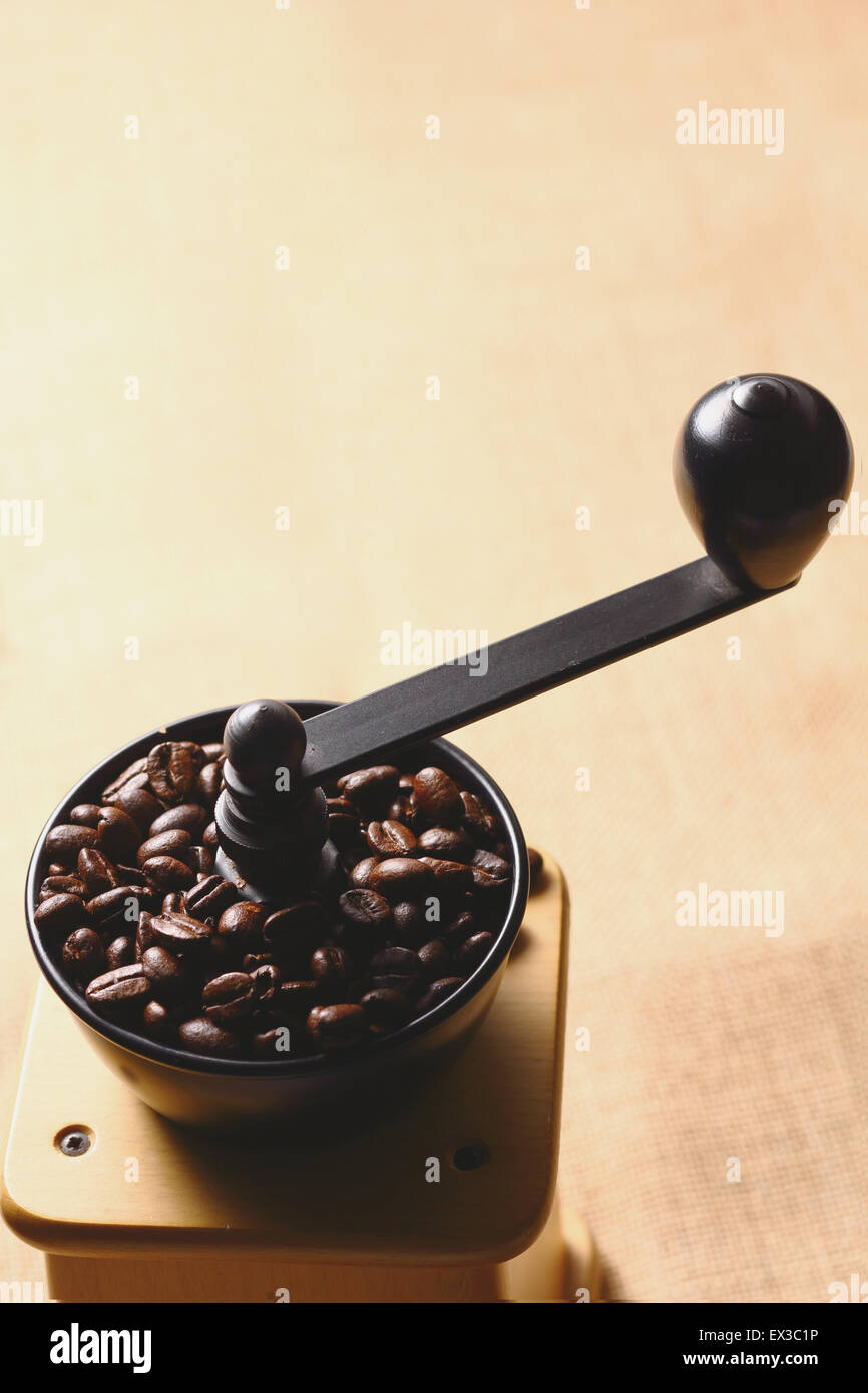 Hand-grinding coffee mill Stock Photo - Alamy