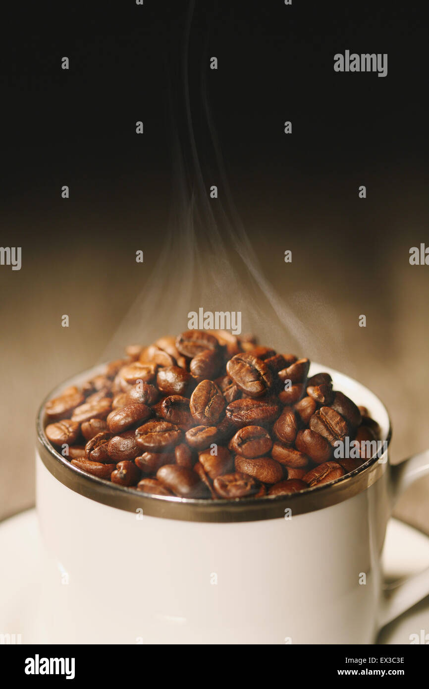 Coffee beans in a cup Stock Photo - Alamy