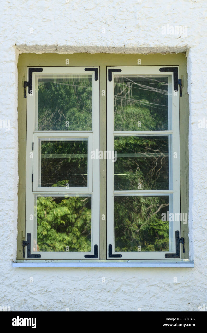 Wooden rural window with tree reflection on mirror Stock Photo - Alamy