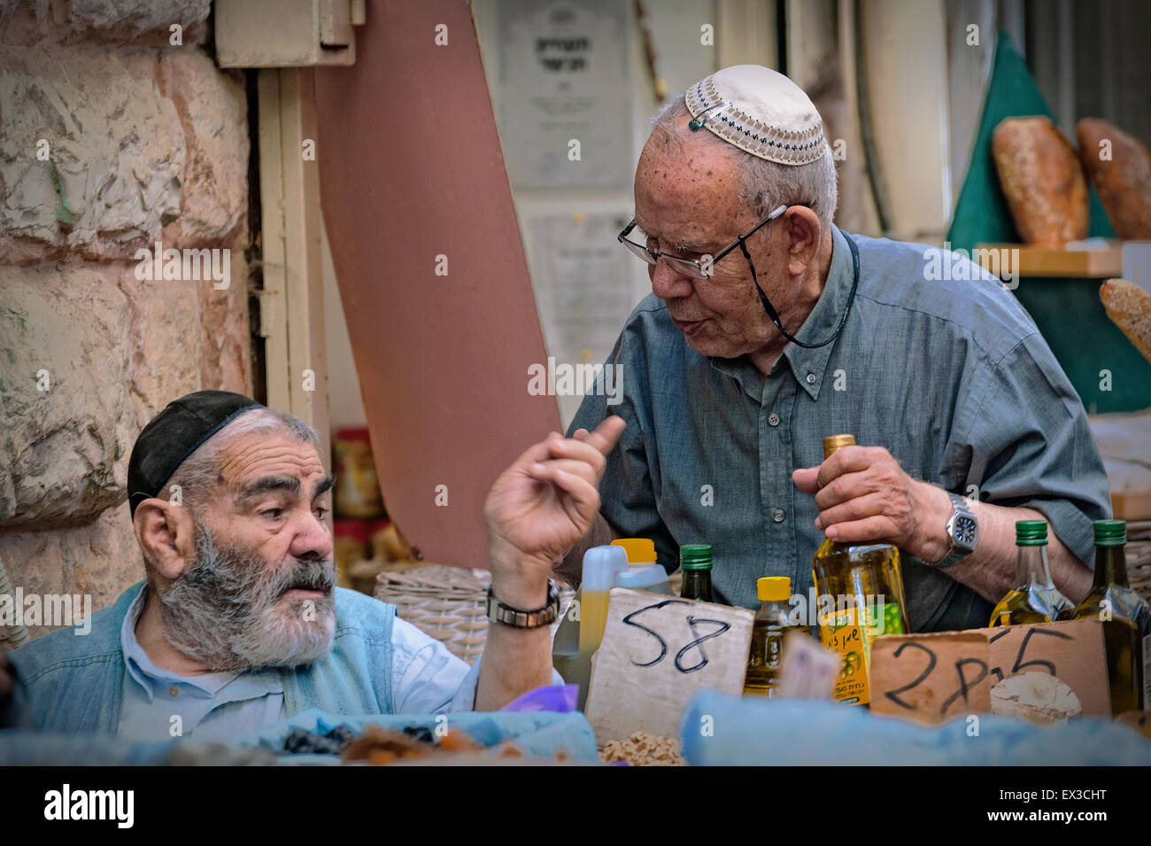 A shopper and vendor at the Machine Yehuda Market in Jerusalem, Israel ...